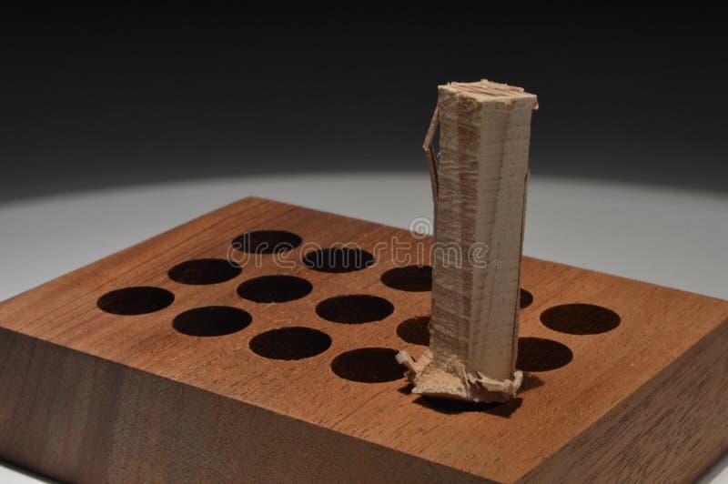 Square peg in a round hole stock photo. Image of adage - 245578172