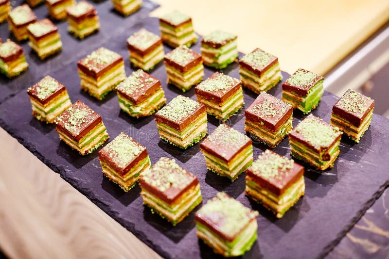 Square pieces of pastries stock photo. Image of green - 181085288
