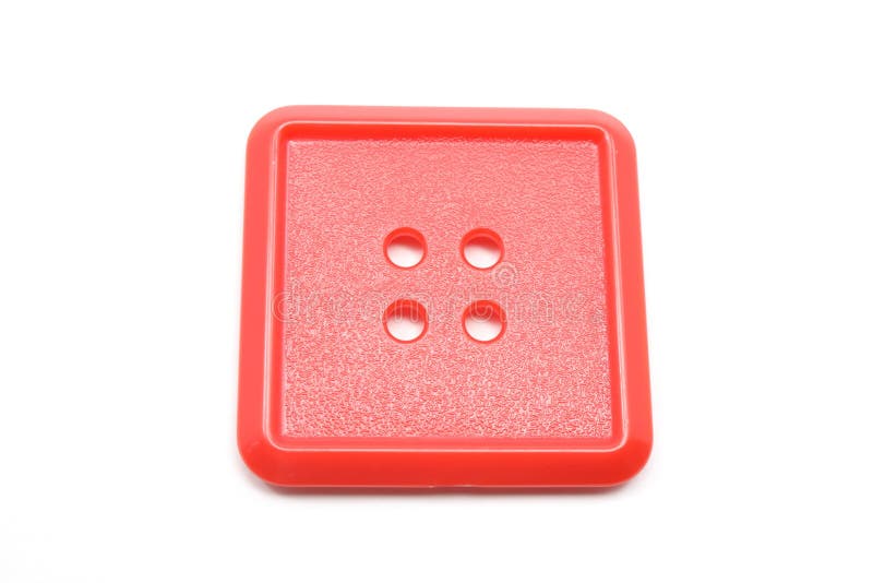 A square red button stock photo. Image of plastic, holes - 14285718