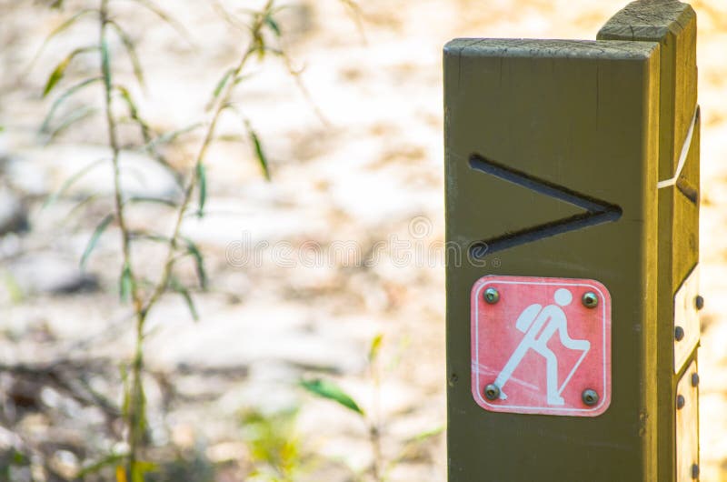 Square Red Walking Track Sign on a Brown Timber. Stock Photo - Image of ...