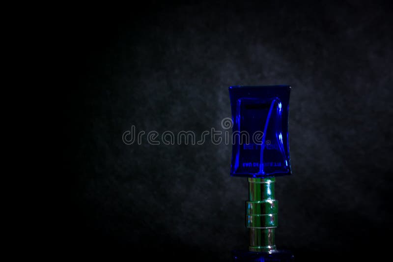 Square Shaped Blue Glass Perfume Bottle Stock Image - Image of light ...