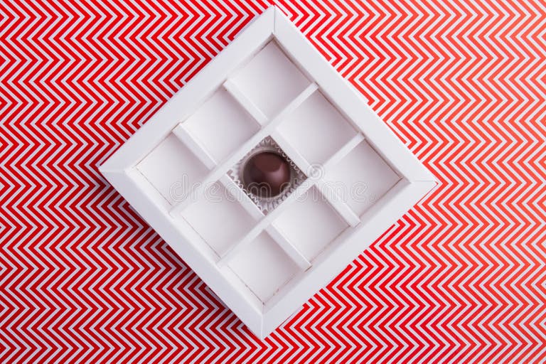 Square-shaped Chocolate Box with One Single Candy. Stock Photo - Image ...