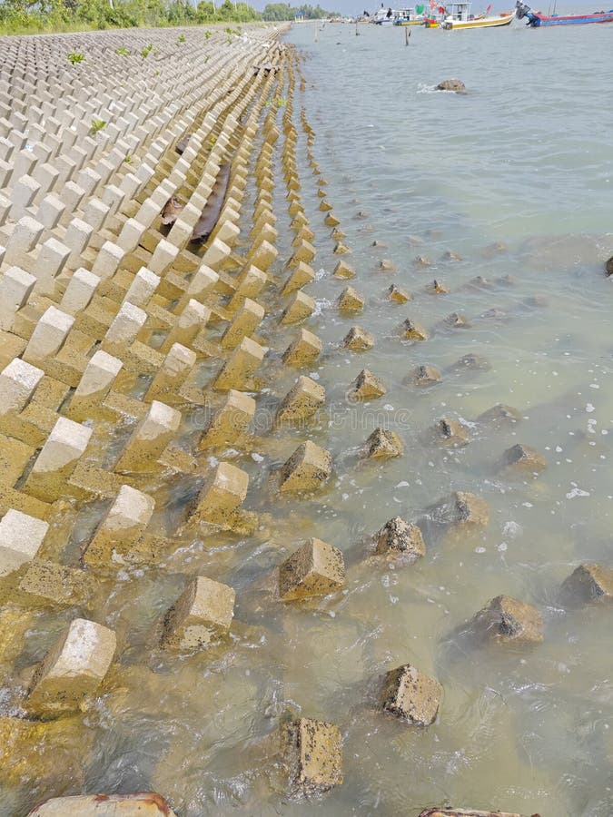 Square-shaped Concrete Coastal Wave Blocker by the Seaside Stock Photo ...