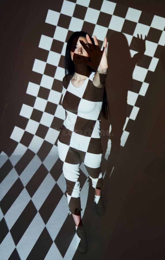 Square Shaped Lights. Beautiful Young Woman is in Projector in the ...