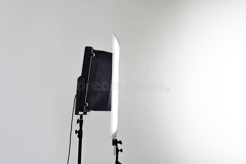 Square Shaped Studio Lighting Equipment and White Fabric Filter on Grey ...