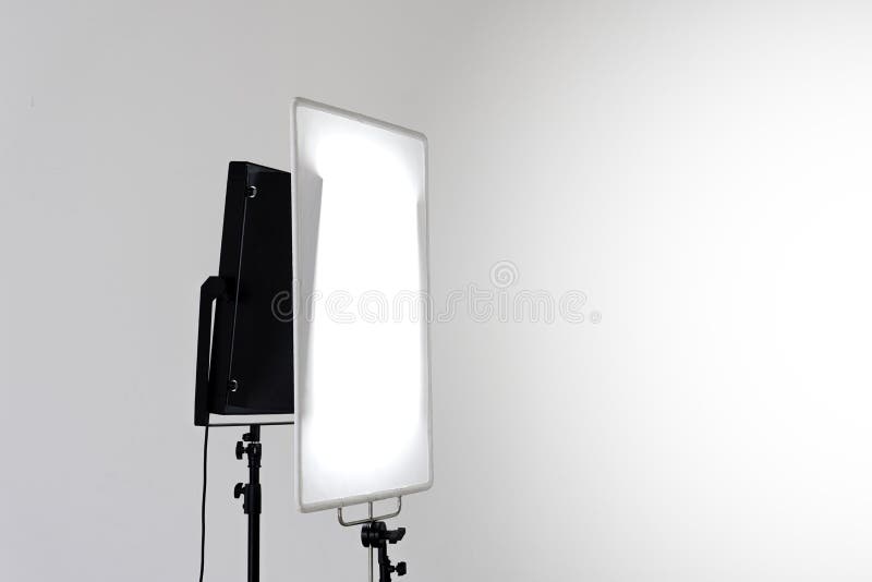 Square Shaped Studio Lighting Equipment and White Fabric Filter on Grey ...