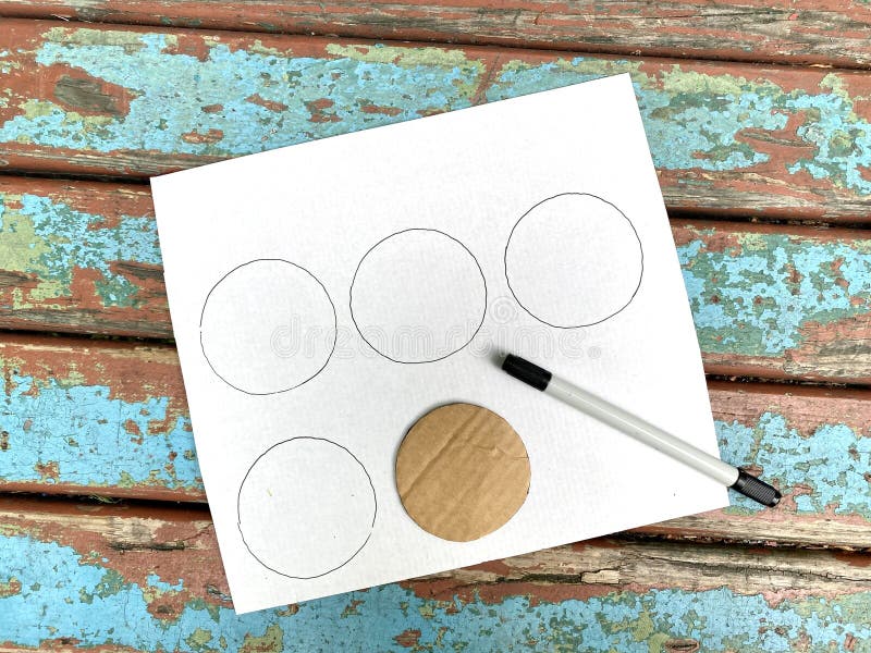 A Square Sheet of Cardboard with Drawn Circles on the Template. Stock ...