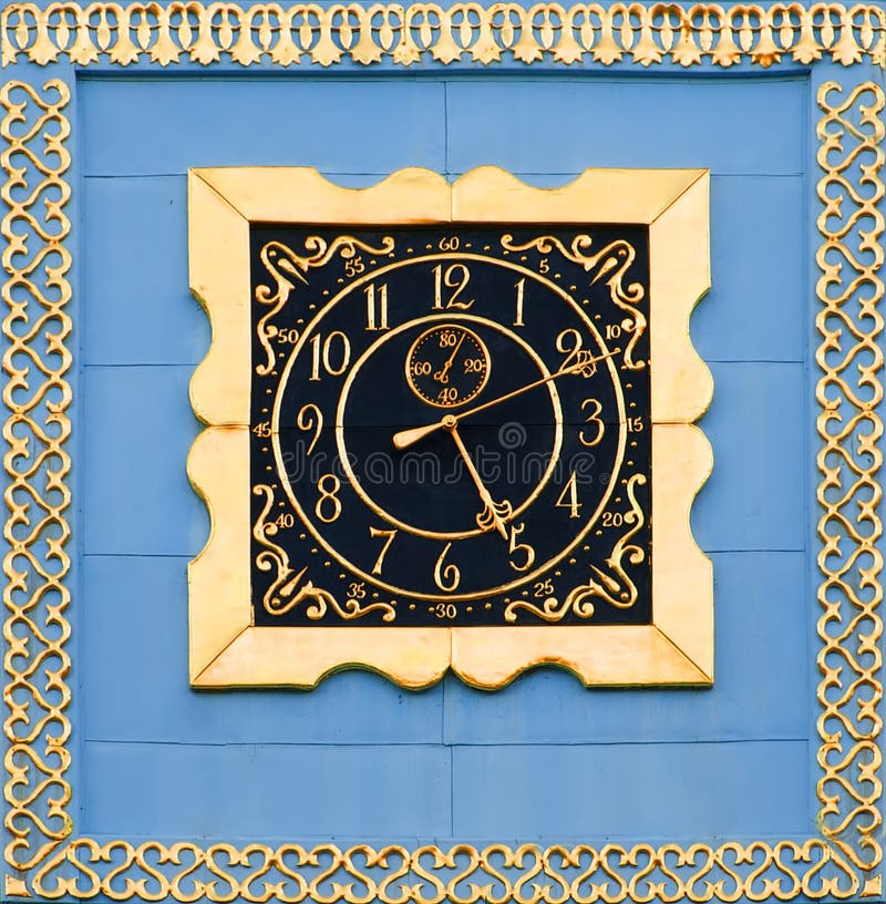 Wrought Iron Gilded Clock on the Tower of the Monastery Stock Image ...