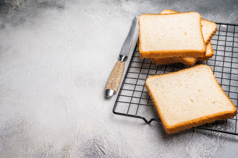 Square Slices of Loaf Wheat Bread for Toasts. White Background Stock ...