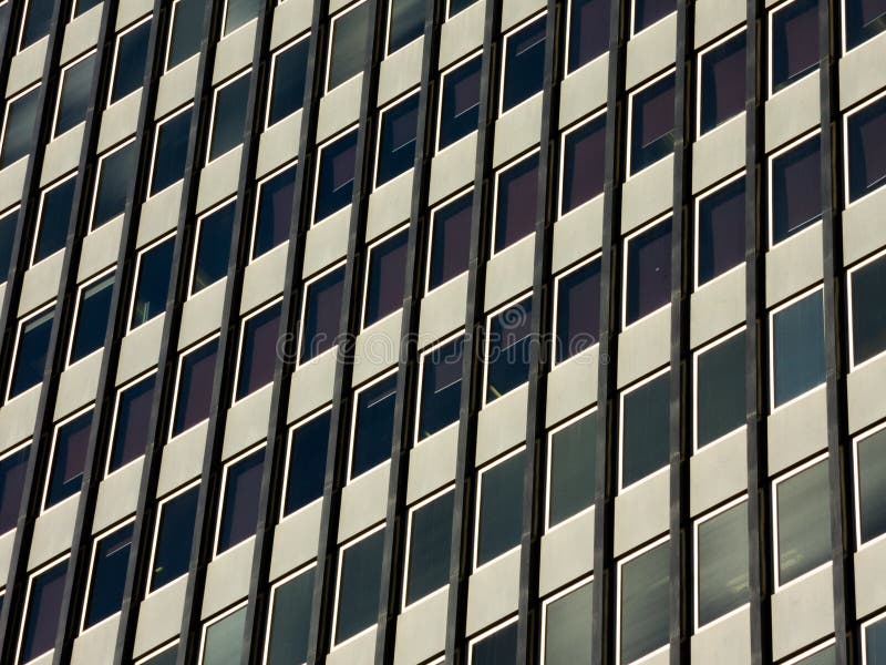 Tall Building Reflect on Clear Blue Glass Window of Tall Building ...