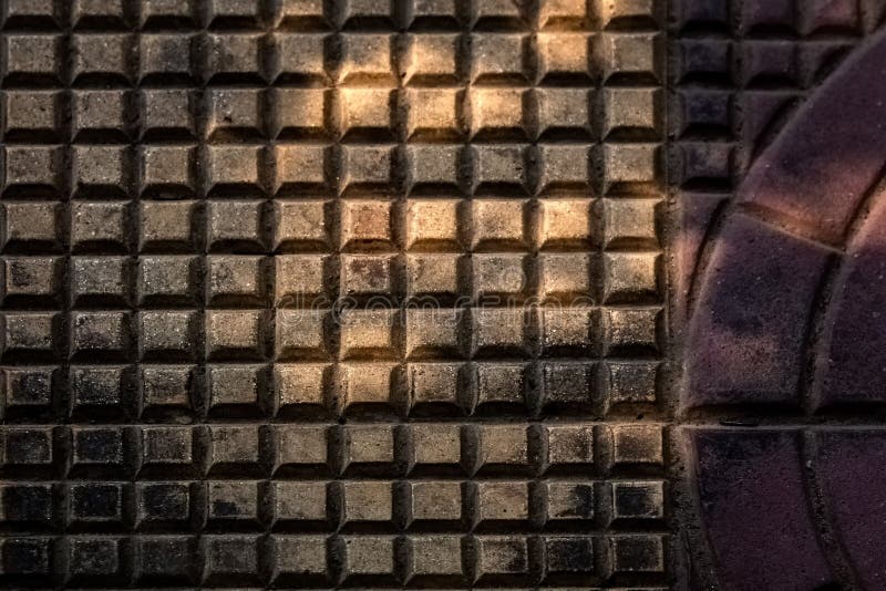 Square Textured Stone Surface with a Metal Rusty Manhole on the Side ...