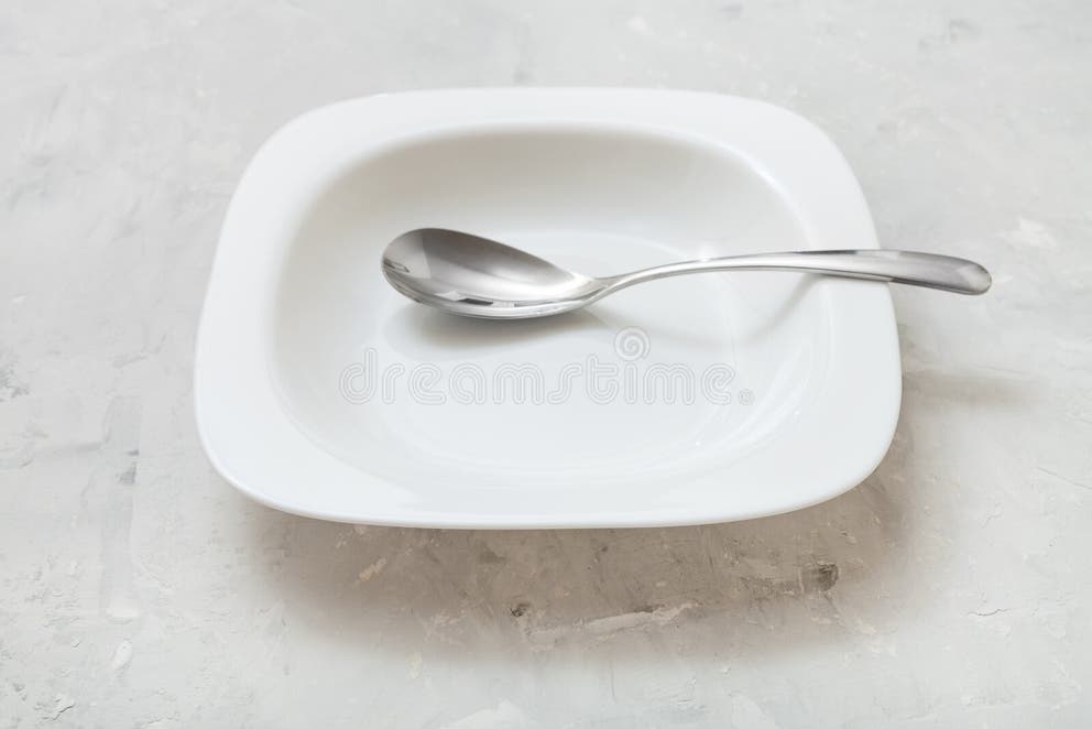 Square White Bowl with White Spoon on Concrete Stock Image - Image of ...