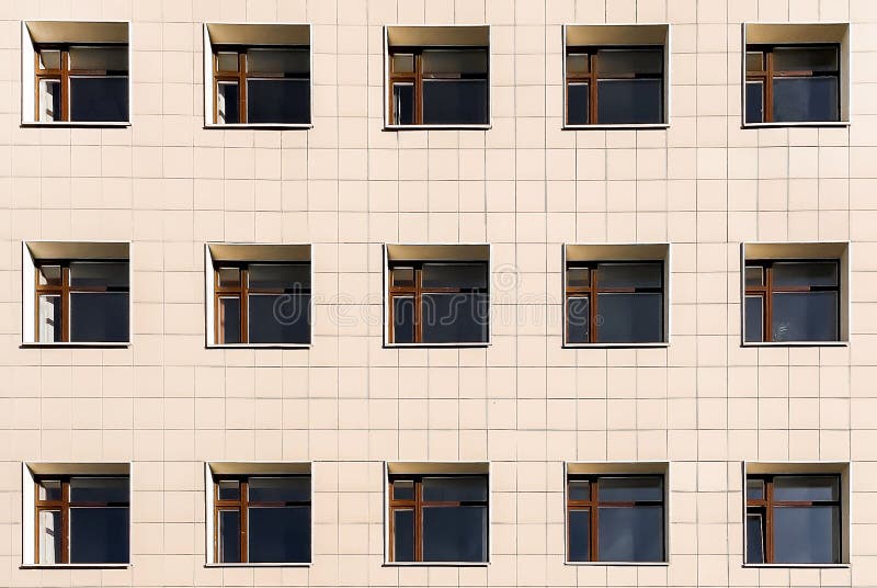 Square Windows of the Building on a Yellow Background, Lots of Windows ...