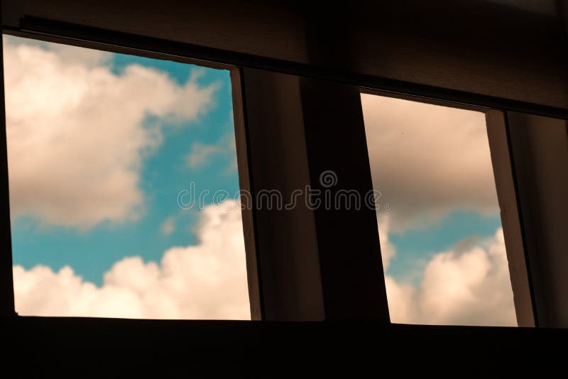 Square Windows that Shows a Clear Blue Sky at the Outside Stock Image ...