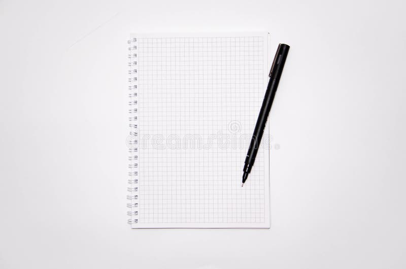 Squared Notebook with Black Pen on a White Background. Record Ideas ...
