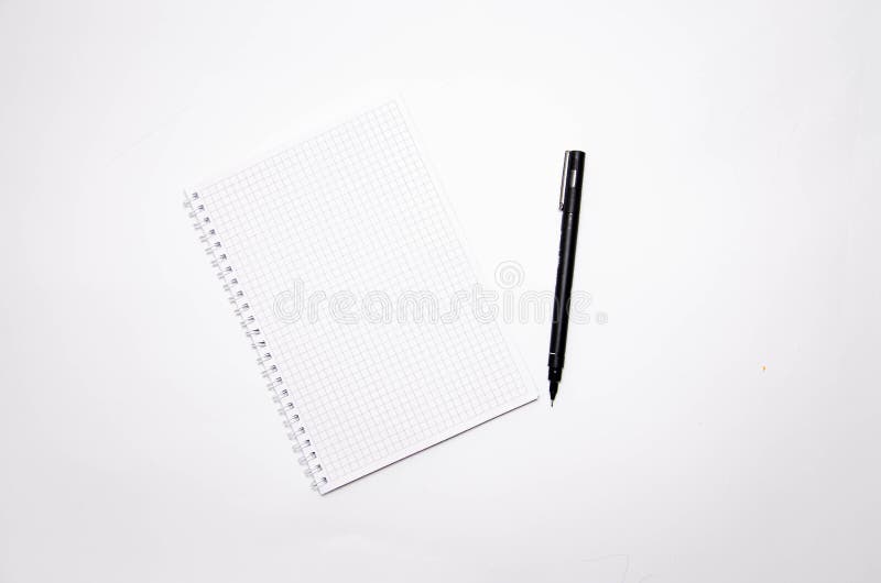 Squared Notebook with Black Pen on a White Background. Record Ideas ...