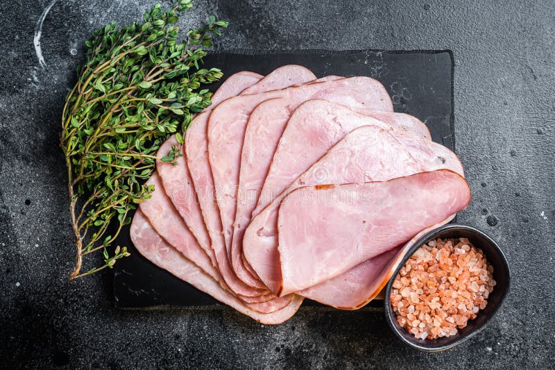 Squared Slices of Lean Pork Ham. Black Background Stock Image - Image ...