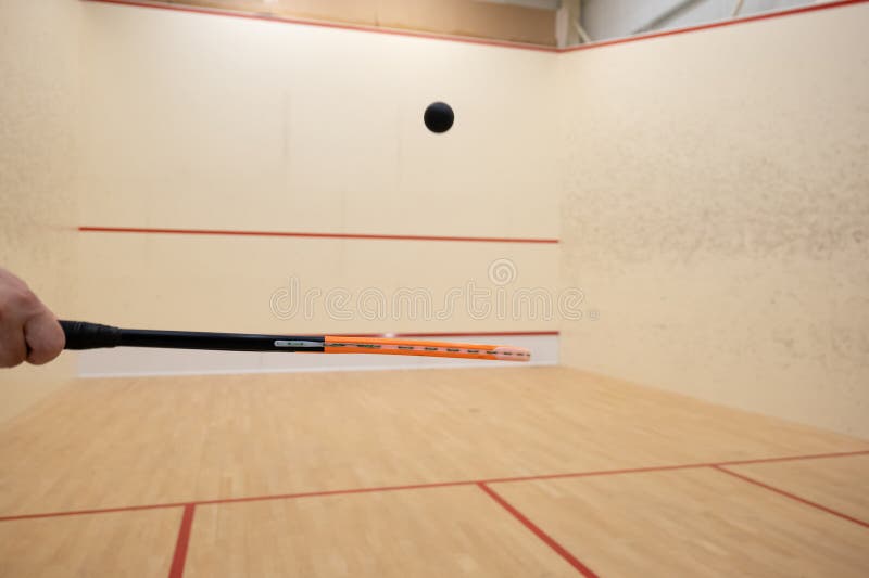 Squash Racket and Ball Inside Court, Ball Bouncing Off the Racket Stock ...