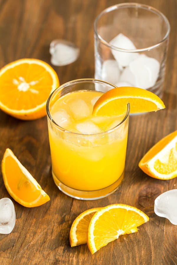 Squeezed Orange Juice and Ice Stock Photo - Image of wooden, heart ...