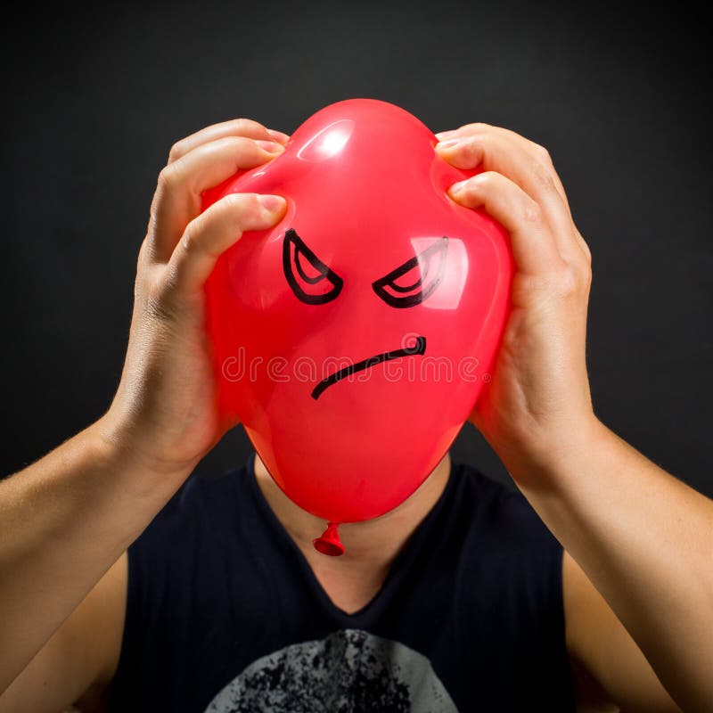 Squeezing angry balloon stock photo. Image of behavior - 26560102