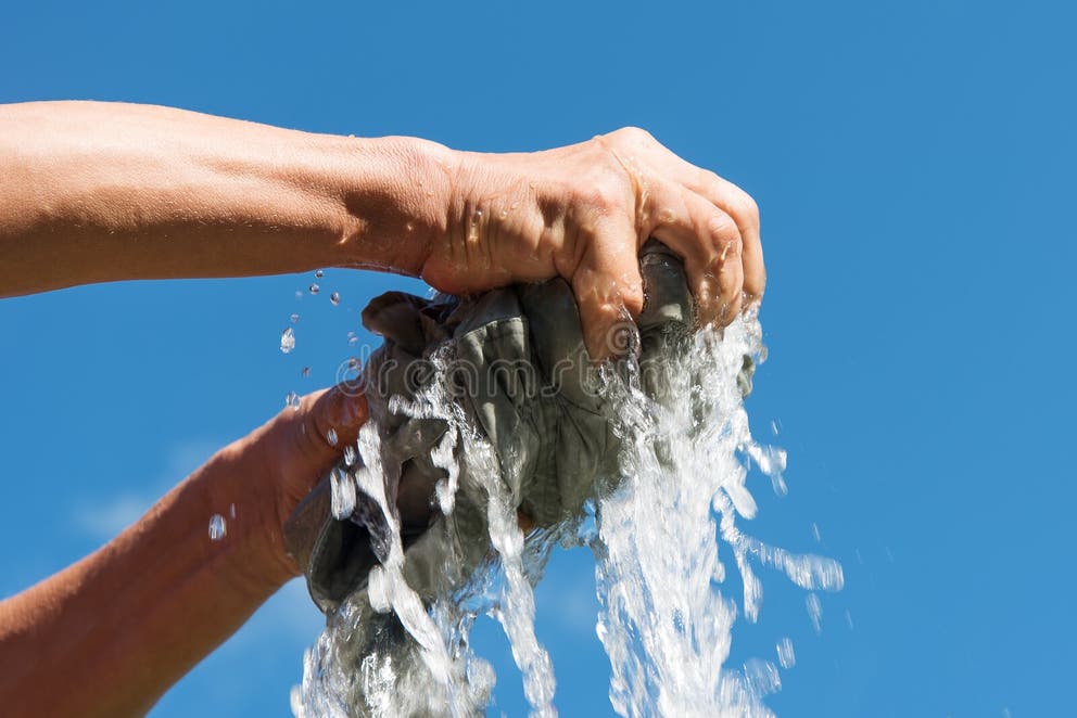 Squeezing of cloth. stock image. Image of home, cloth - 58977659