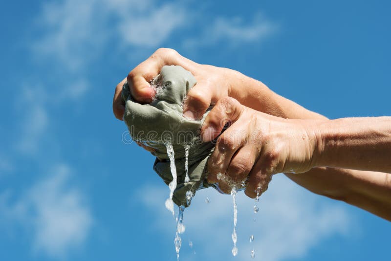 Squeezing of cloth. stock photo. Image of towel, squeeze - 58977934