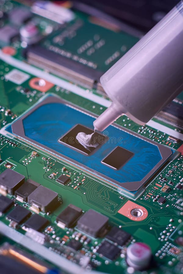 Squeezing Fresh Thermal Paste on Processor Stock Photo - Image of ...