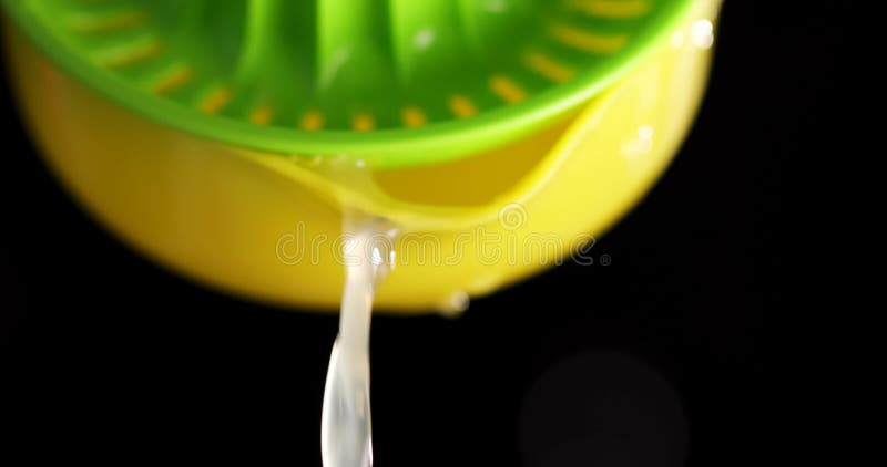 Squeezing the Juice of a Freshly Squeezed Lemon. Stock Video - Video of ...