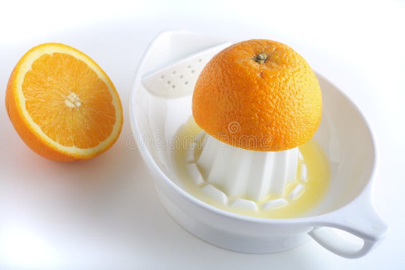 Squeezing an orange stock image. Image of sliced, juice - 13149595