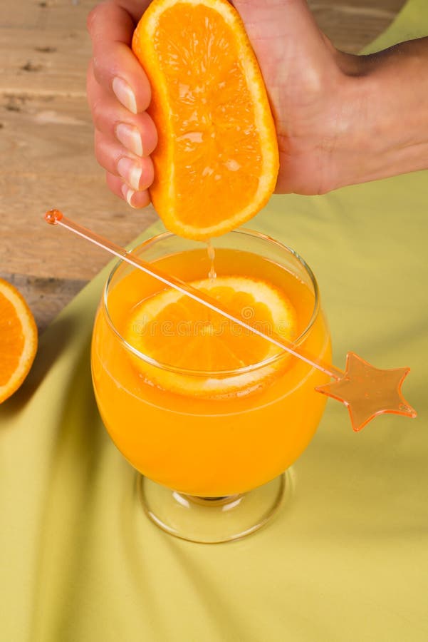 Squeezing Orange Stock Photos - Download 1,297 Royalty Free Photos