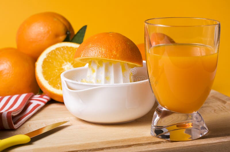 Squeezing orange juice stock image. Image of fruit, nonalcoholic - 7445149