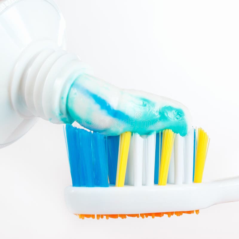 Squeezing toothpaste tube stock image. Image of counting - 7112539