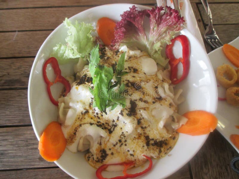 Sea Food - Squid Bowl in Cream Stock Photo - Image of taking, changing ...
