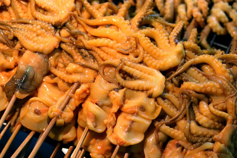 Squid, Fresh Squid on Panel Grid Rack in the Market Stock Image - Image ...