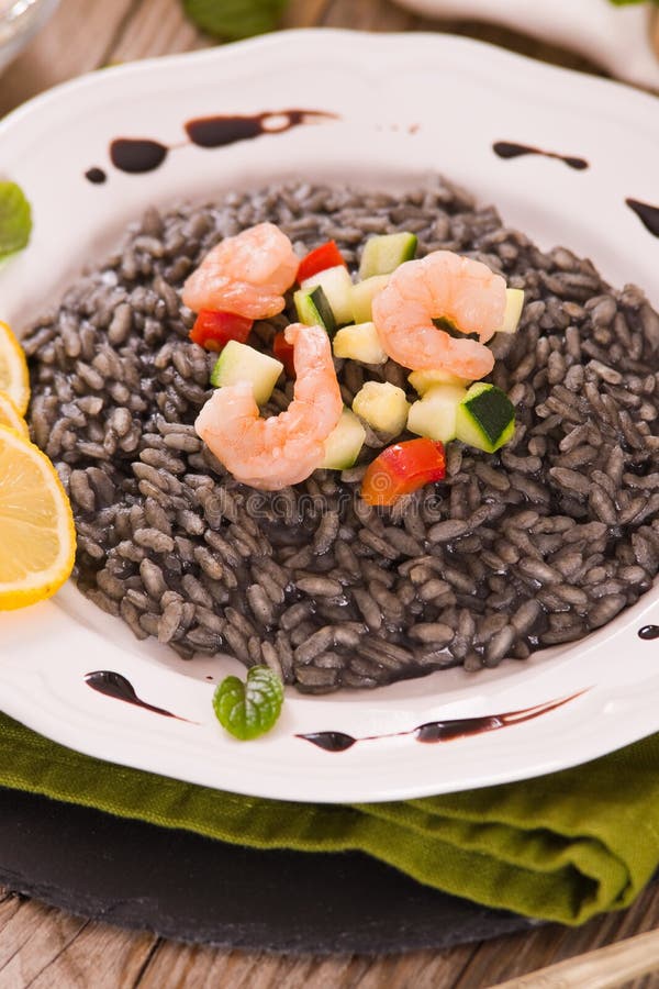 Squid ink risotto. stock image. Image of italy, cuisine - 173363619