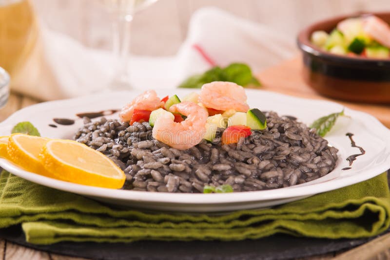 Squid ink risotto. stock photo. Image of dinner, black - 176154634