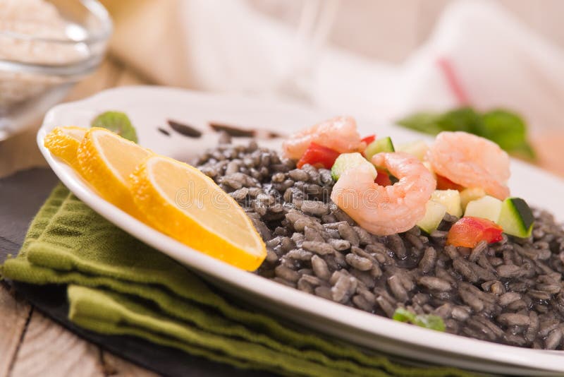 Squid ink risotto. stock photo. Image of cuisine, ingredient - 198330842