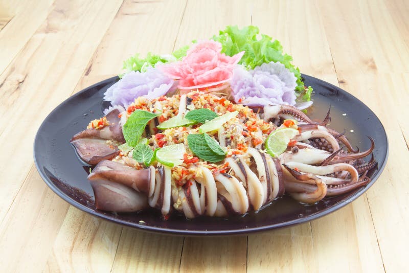 Squid Steamed with Lime,Thai Food , Hot and Spicy. Stock Photo - Image ...