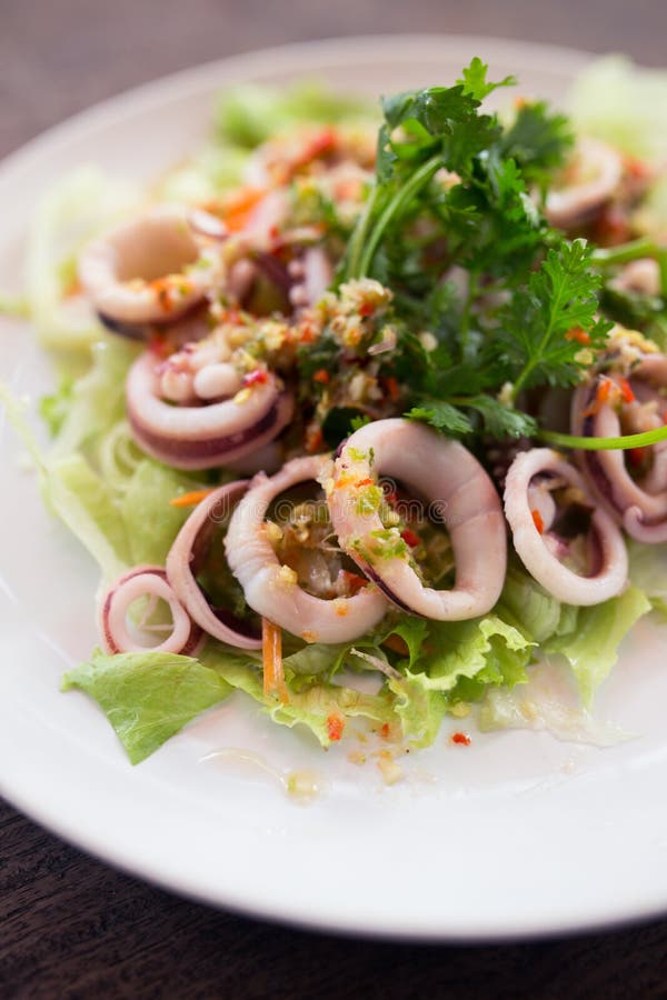 Squid steamed with lime stock photo. Image of calamari - 76841128