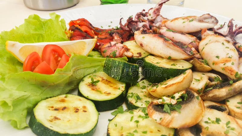 Squids stock photo. Image of green, squids, food, grilled - 64724548
