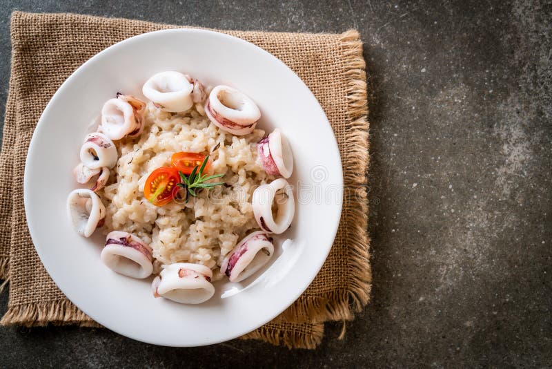 Squids or octopus risotto stock image. Image of meal - 156453223