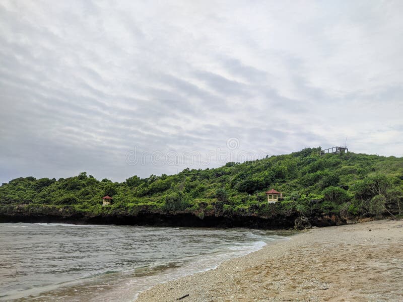Srau Beach in Pacitan, Indonesia Stock Image - Image of river, ocean ...
