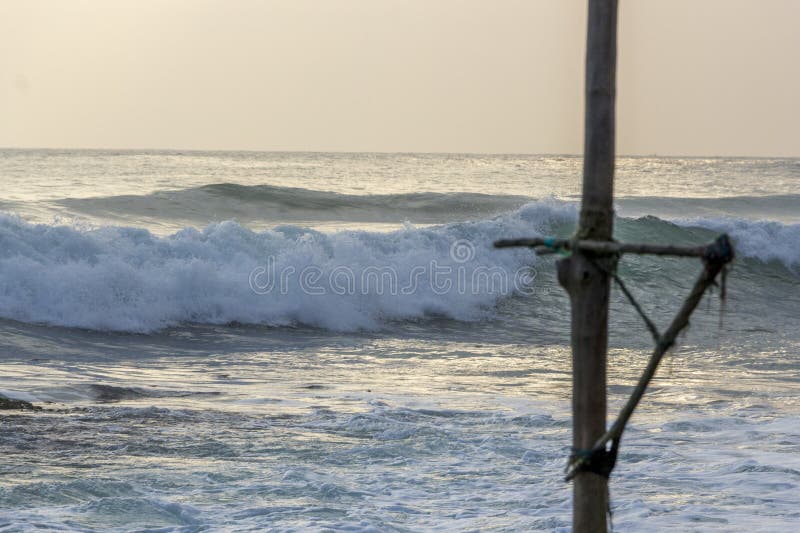 Sri Lanka - Mirissa - Beach - Ocean Wave Breaking beside Stilt Pole ...