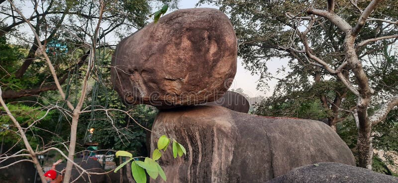 Srone in Surrounded trees stock photo. Image of green - 212434494