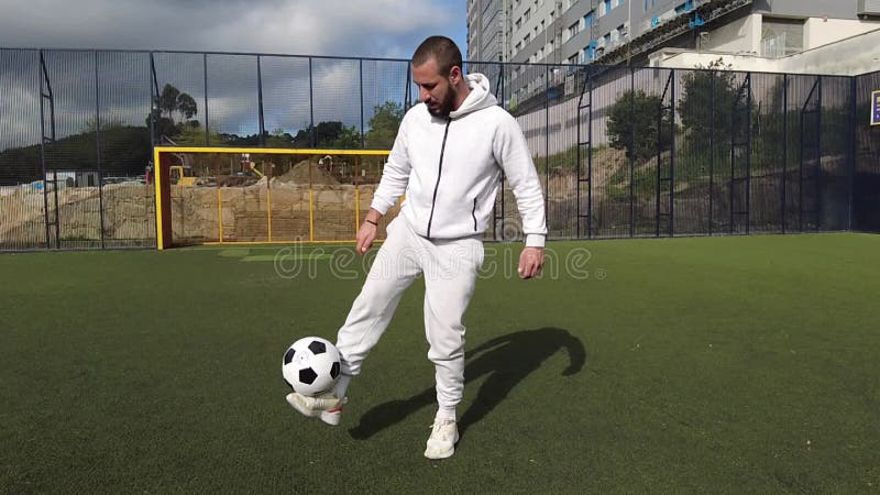 Ssoccer Player Juggles a Ball on a Soccer Field Stock Video - Video of ...