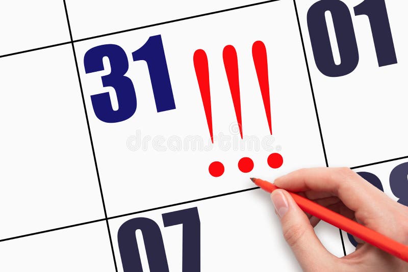 31st Day of the Month. Hand Writing Three Exclamation Marks on Calendar ... 31st Day of the Month. Hand Writing Three Exclamation Marks on Calendar ...