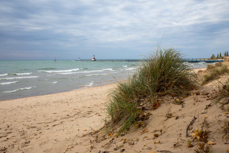 St. Joseph North Pier Lighthouse and Lake Michigan Beach in Fall Stock ...