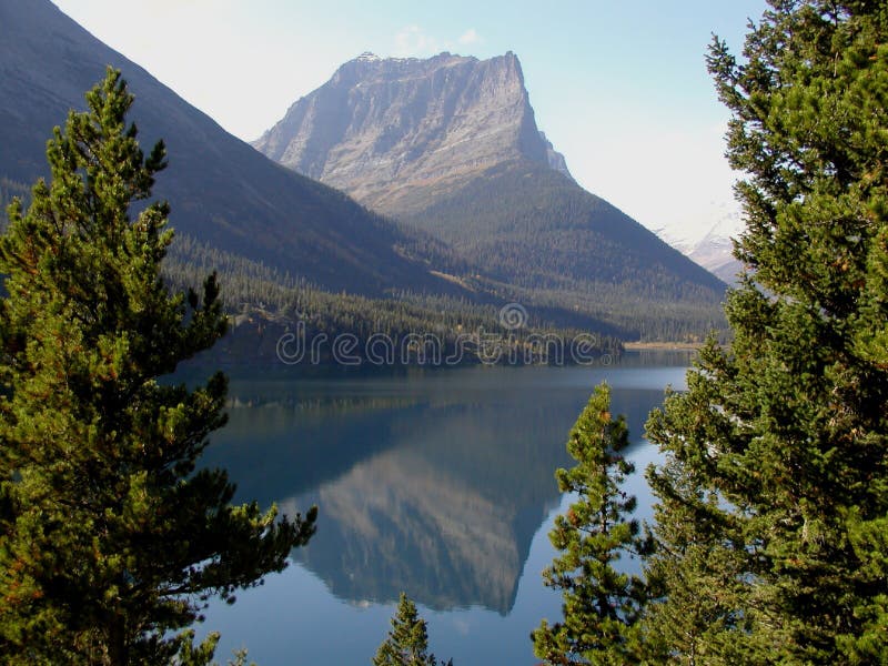 St Mary Lake Reflection stock image. Image of fall, warm - 790111