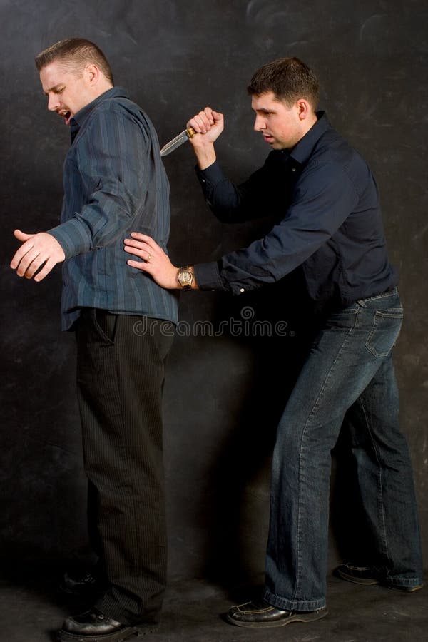 Stab in the back stock photo. Image of bitter, back, annoyed - 1701264