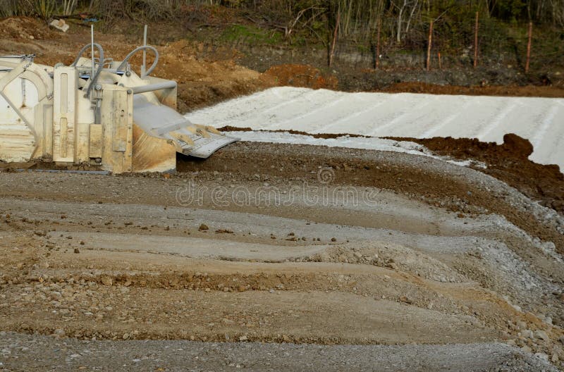 Construction Preparation by Leveling and Soil Compaction by Vibrating ...